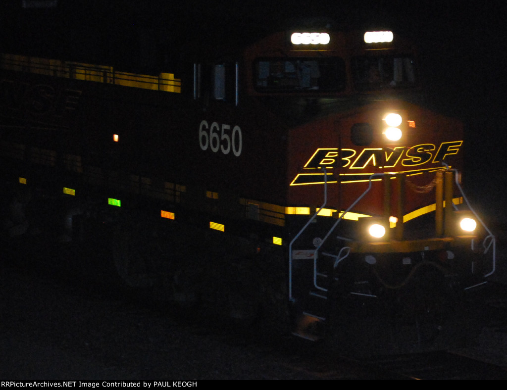 BNSF 6650 Lights up her BNSF Swoosh Reflective Logo and LED Road Number lights as she passes me ...